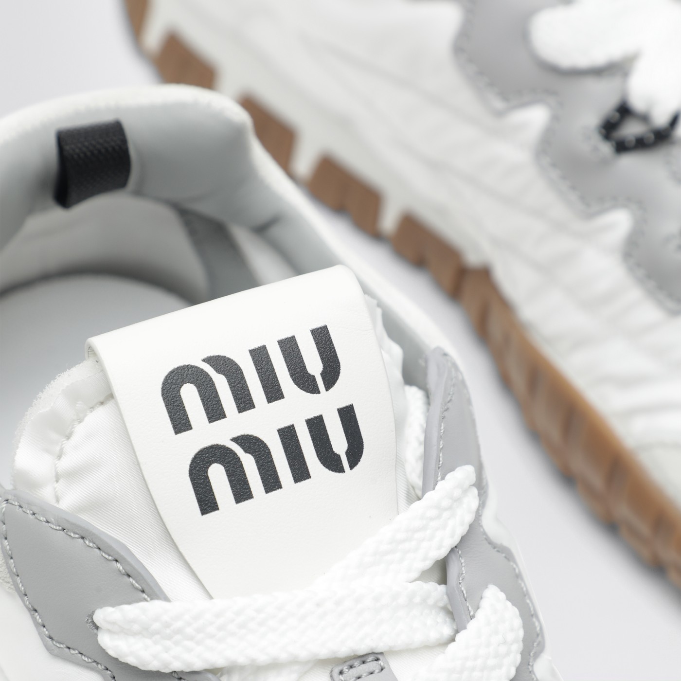 Miu Miu White Tyre sneakers in technical fabric and suede | TheDoubleF