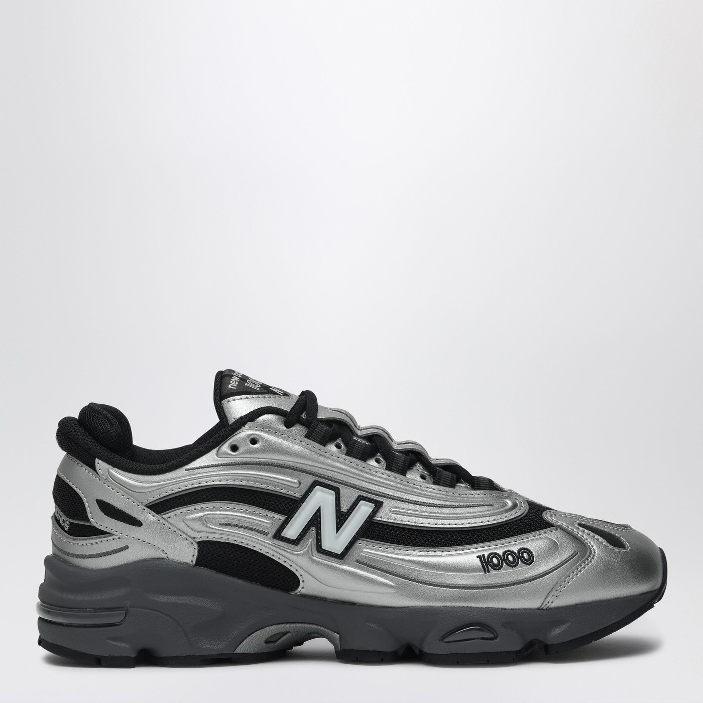New Balance Sneakers 1000 SL in metallic silver leather | TheDoubleF