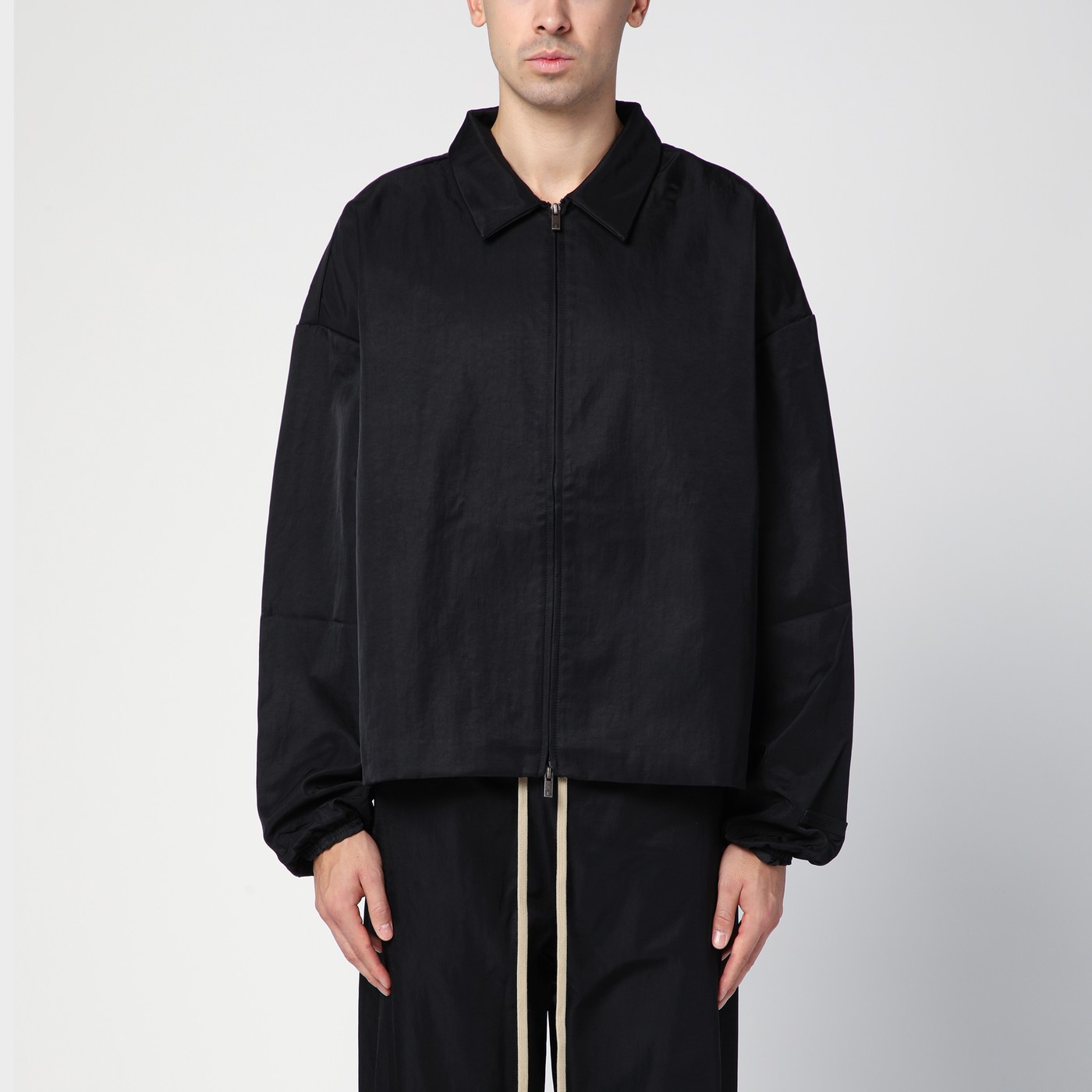Fear of God Essentials Black recycled nylon jacket | TheDoubleF