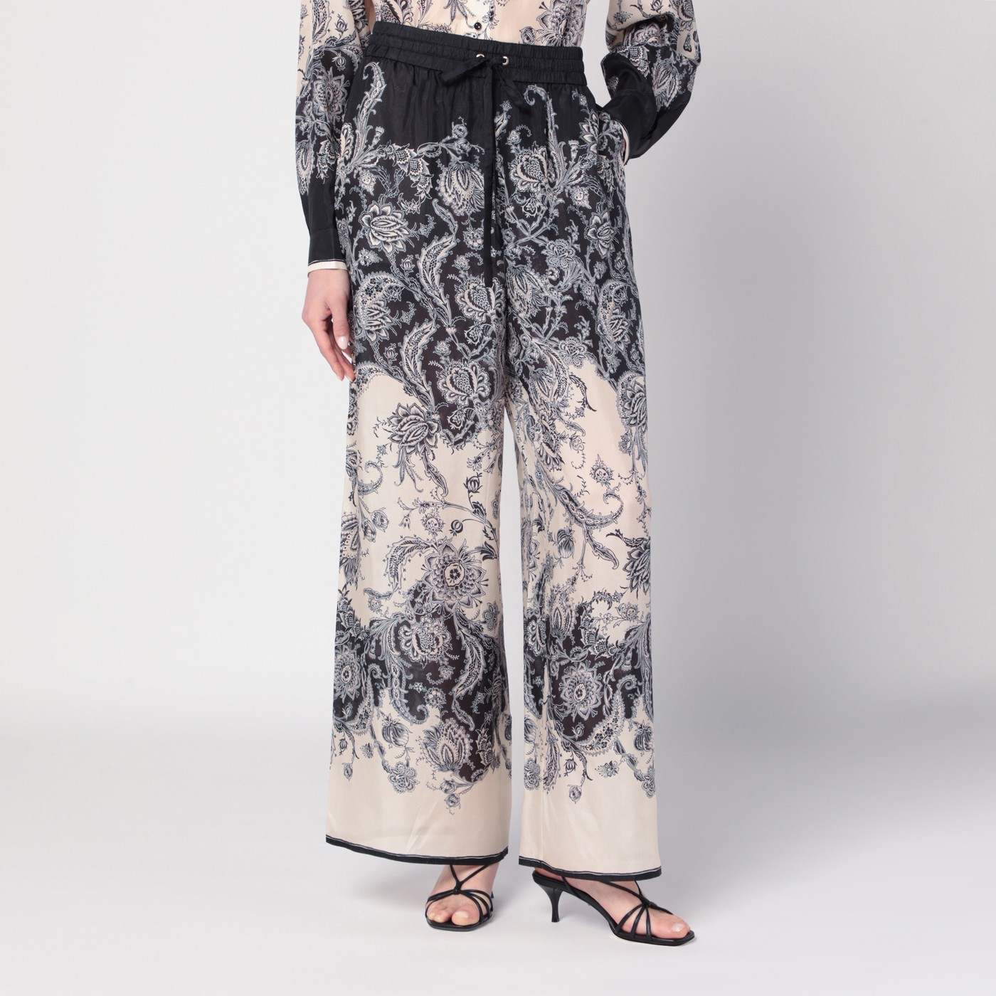 ZIMMERMANN Cream Rhiannon trousers with fantasy print | TheDoubleF